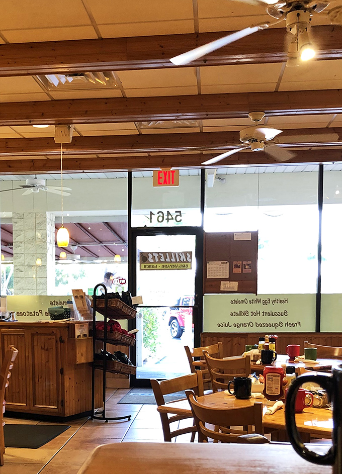 Even the exit view tempts you to stay longer – wooden beams overhead, cheerful mugs on tables, and the promise of "see you tomorrow."