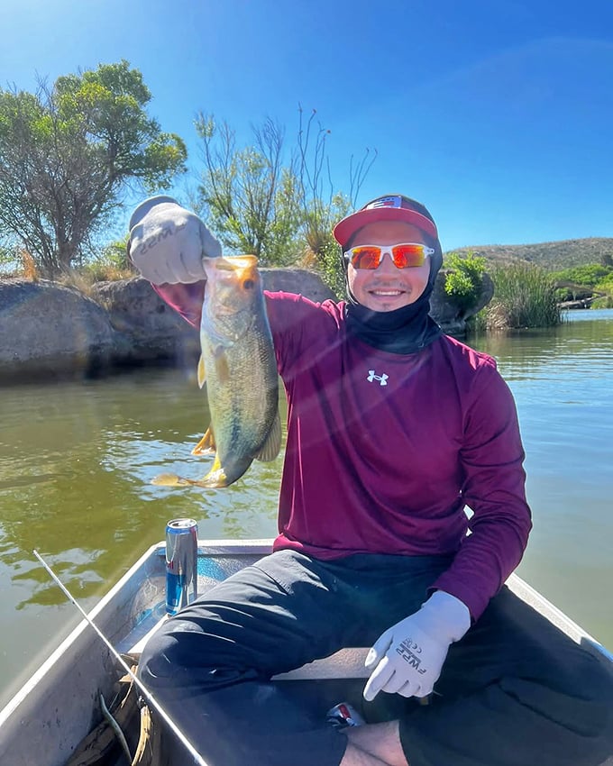 "I caught dinner AND bragging rights!" That smile says it all&mdash;largemouth bass: 0, Happy angler: 1.
