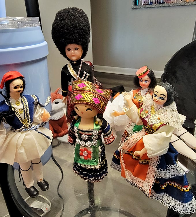 A miniature United Nations of dolls with stories to tell. These cultural ambassadors bring global flair to any shelf or collection.