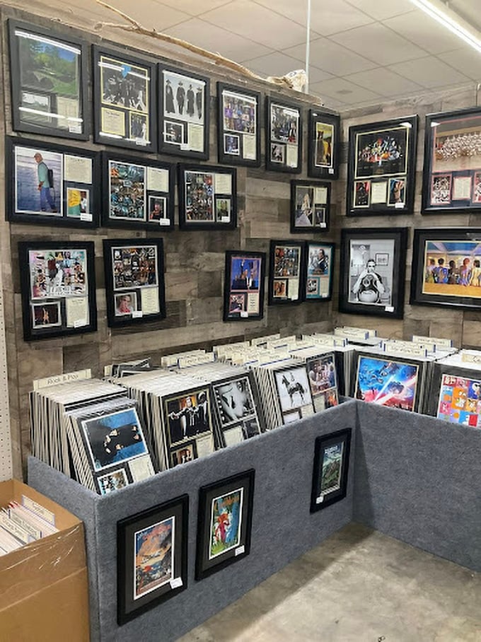 A wall of nostalgia where signed memorabilia and vintage prints remind us that fame was different before Instagram made everyone a celebrity.