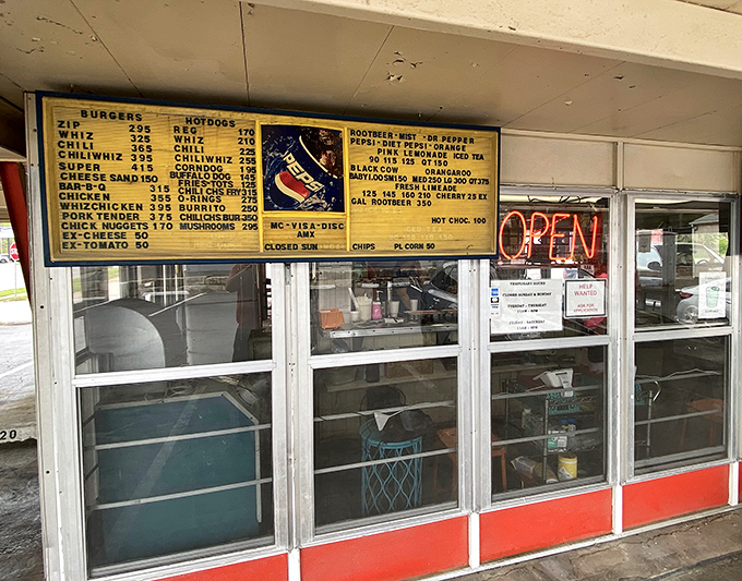 The ordering window&mdash;where dreams and hunger meet. Simple, straightforward, and ready to serve up happiness on a tray.