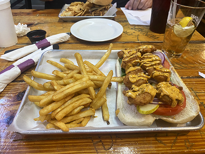 The Gator Sub: a sandwich that requires both hands and possibly a nap afterward. Those fries aren&rsquo;t just golden&mdash;they&rsquo;re 24-karat delicious.