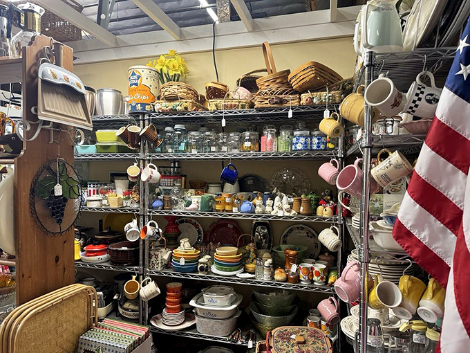 Kitchen Americana in all its colorful glory. That American flag seems to salute the patriotic duty of collecting mismatched coffee mugs.