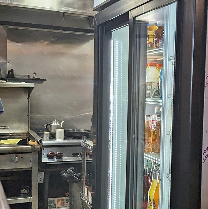 Where the magic happens! A glimpse into the compact kitchen that produces those legendary tenderloins&mdash;efficiency in stainless steel.