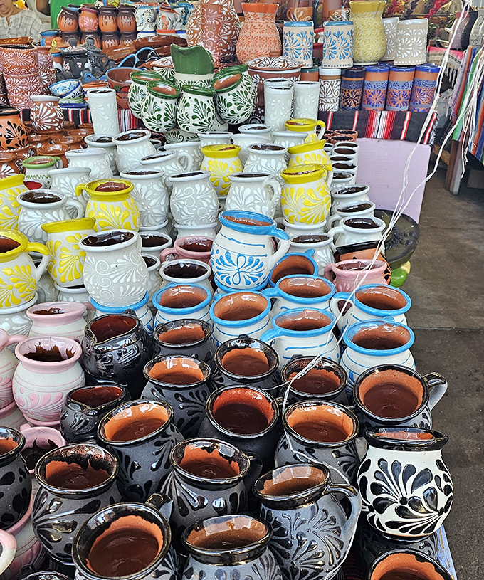 Handcrafted pottery in a kaleidoscope of colors. These aren't just containers&mdash;they're functional art waiting to brighten someone's kitchen.