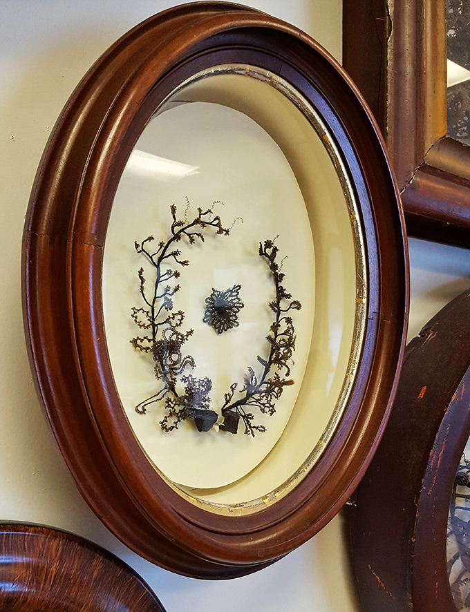 Delicate strands of hair transformed into an heirloom artwork that's survived centuries. Imagine the patience required for such detail!