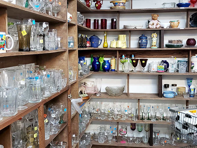 The glassware section sparkles under fluorescent lights, each piece waiting to toast new memories in a different home.