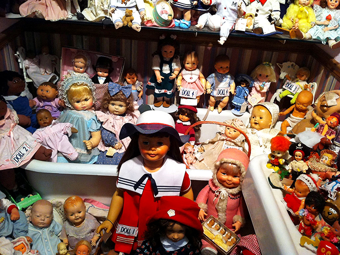 This isn't just a crowd; it's a convention of dolls from different eras, each with their own silent stories to tell.