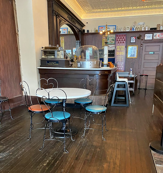 The ice cream parlor section features vintage wire chairs and tables that have witnessed countless first dates and family celebrations.