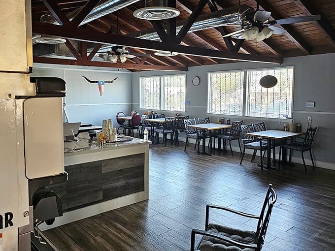 Where Texas meets California under exposed wooden beams. Simple tables waiting for the main event&mdash;a parade of smoky delights.