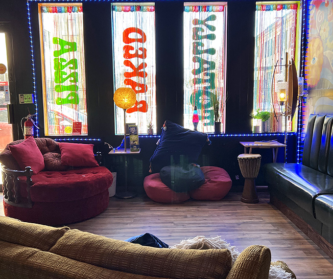 The lounge area feels like your coolest friend's basement, if that friend also happened to make life-changing pizza.