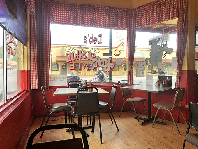 Red-checkered curtains frame the view of Wickenburg's main street, where every table feels like the best seat in the house.