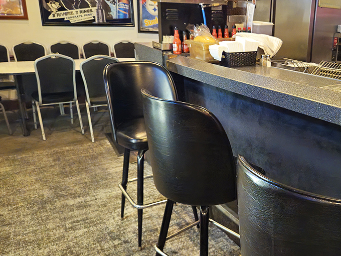 Black vinyl stools and a well-worn counter tell you everything about Nadine's priorities: substance over style, comfort over trendiness, regulars over Instagram influencers.