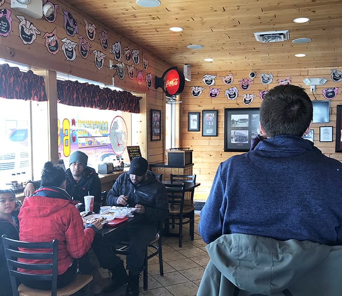 The pig mascots watching over diners seem to say, "We've made the ultimate sacrifice, and you're welcome."