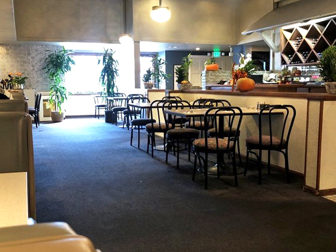 Another dining area reveals Kathleen's knack for creating spaces that feel both spacious and intimate&mdash;like dining in a stylish friend's home.