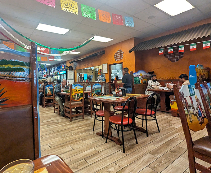 Colorful papel picado banners dance overhead as diners enjoy authentic meals. The festive atmosphere makes every visit feel like you've stumbled upon a neighborhood celebration.