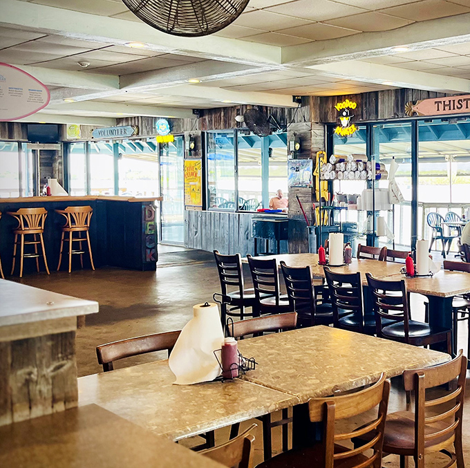 Rustic wooden accents and water views create that "I'm definitely coming back here" atmosphere that keeps locals returning for decades.