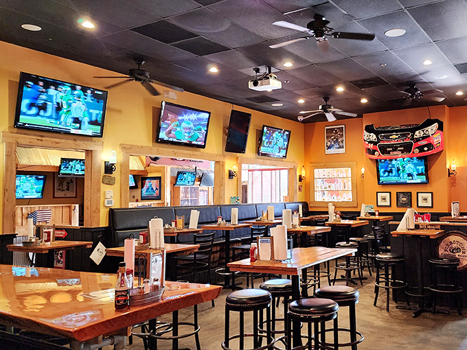 Multiple TVs ensure you won't miss the game, but the real sport here is competitive eating. Everyone's a champion.
