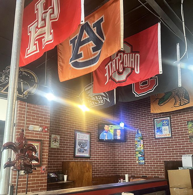 College pennants hang like colorful battle flags, declaring this spot neutral territory where Seminoles, Gators, and Tigers fans unite under the banner of good food.