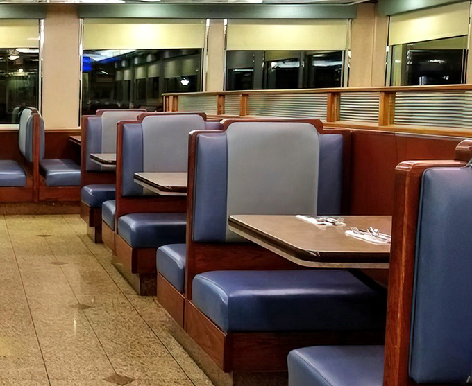 The blue vinyl booths aren't just seating&mdash;they're time machines to when conversations happened face-to-face instead of through screens.