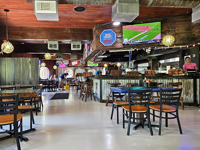 No designer needed here&mdash;just decades of authentic coastal charm. The wooden beams, hanging lights, and comfortable seating create the perfect backdrop for seafood feasting.