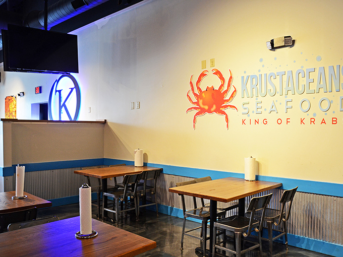 The "King of Krab" wall art says it all. Simple decor with splashes of ocean blue creates an atmosphere that's casual, inviting, and focused on seafood.