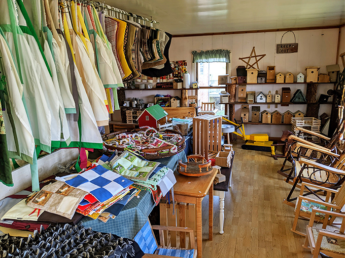 Handcrafted birdhouses and quilts share space with baked goods, because in Amish country, craftsmanship extends beyond the kitchen.