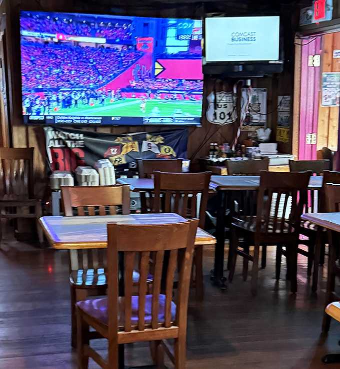Sports on big screens, wooden chairs that have heard a thousand stories, and tables ready for serious eating business.
