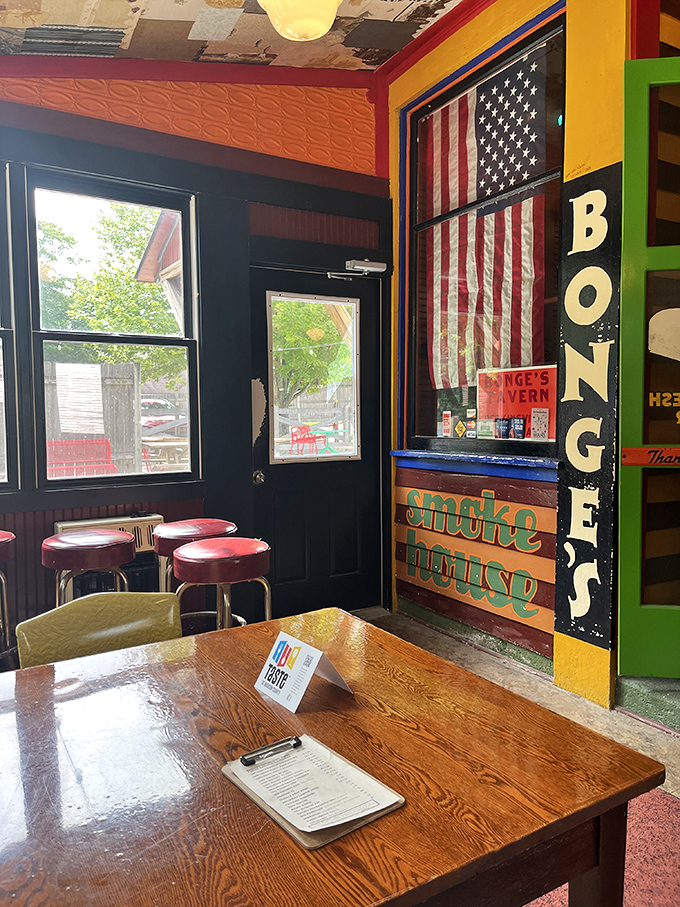 Colorful tablecloths brighten the wood-paneled dining room, where string lights create the feeling of a perpetual celebration of good food and company.