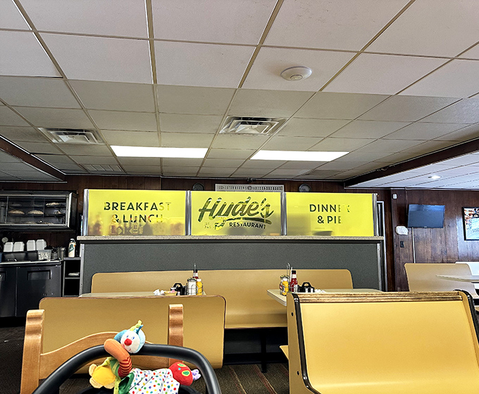Yellow booths worn smooth by generations of Hamilton residents. That toy in the corner? Someone's keeping the little ones entertained while adults worship at the altar of gravy. 