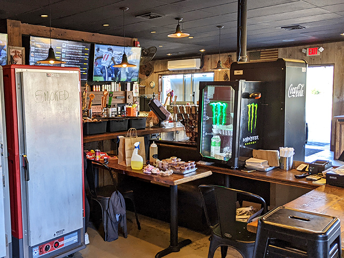 The drink station features that giant gear wheel&mdash;a reminder that good barbecue, like good machinery, requires precision, patience, and regular maintenance.