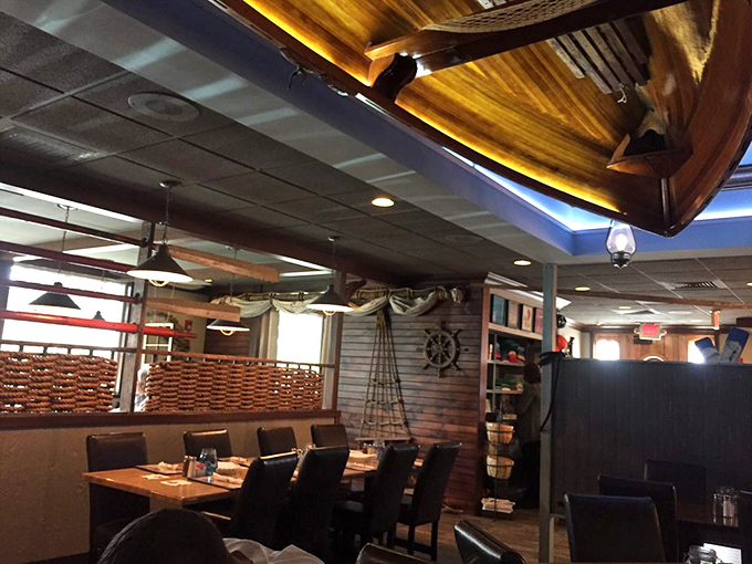 A boat hanging from the ceiling? That's how you know the seafood's legit. Maritime charm meets dining comfort in this thoughtfully designed space.