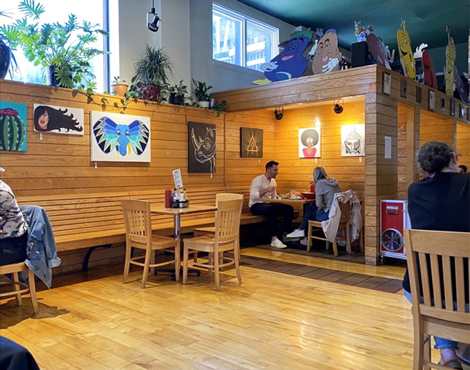 Tommy's wooden booths create intimate dining nooks that feel like your own private restaurant. The perfect setting for both first dates and family reunions.