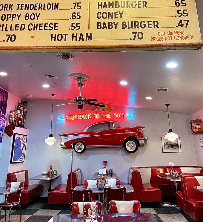 "Step Back to the 50's" isn't just a neon sign &ndash; it's a promise delivered through red booths, classic car decor, and food that predates food photography.