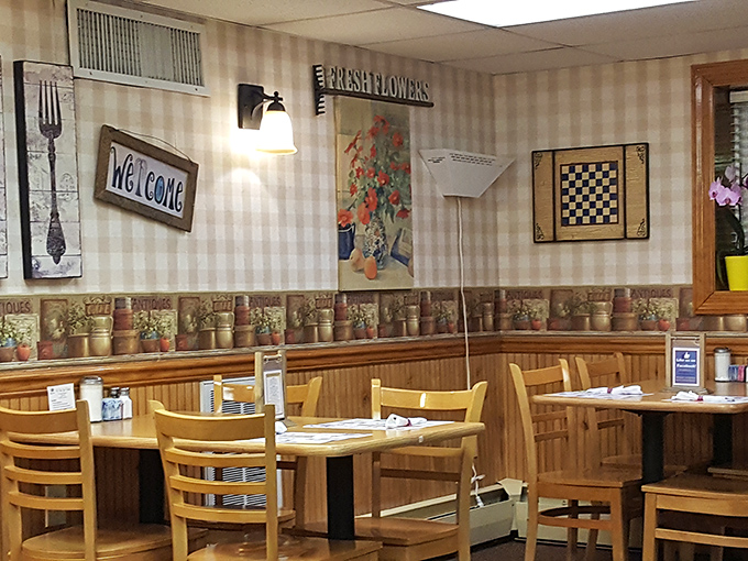 Striped wallpaper and homey decor create that "grandma's dining room" feeling that makes every meal taste just a little bit better.