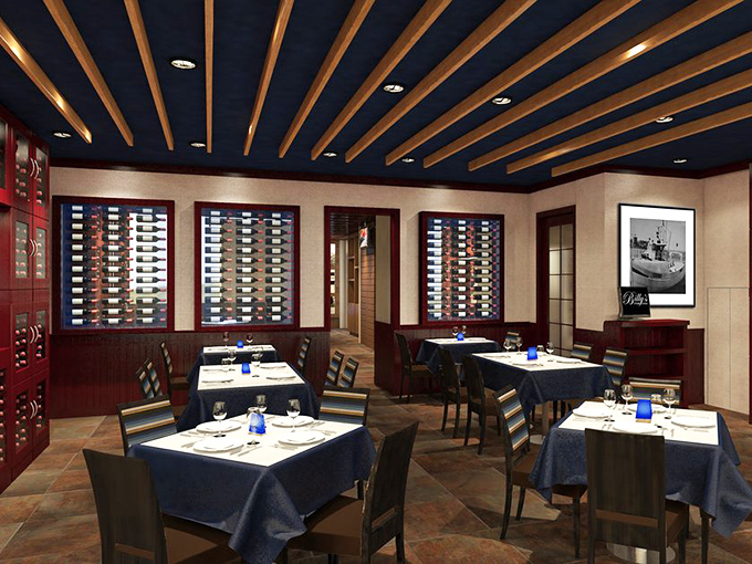 Wooden beams overhead, crisp linens below, and illuminated wine displays create a dining room that feels both nautical and luxurious.