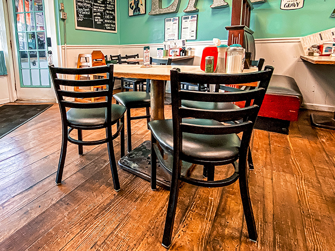 Simple wooden floors, practical tables, and chairs that have heard a thousand stories&mdash;diner design 101 where function creates its own kind of beauty.