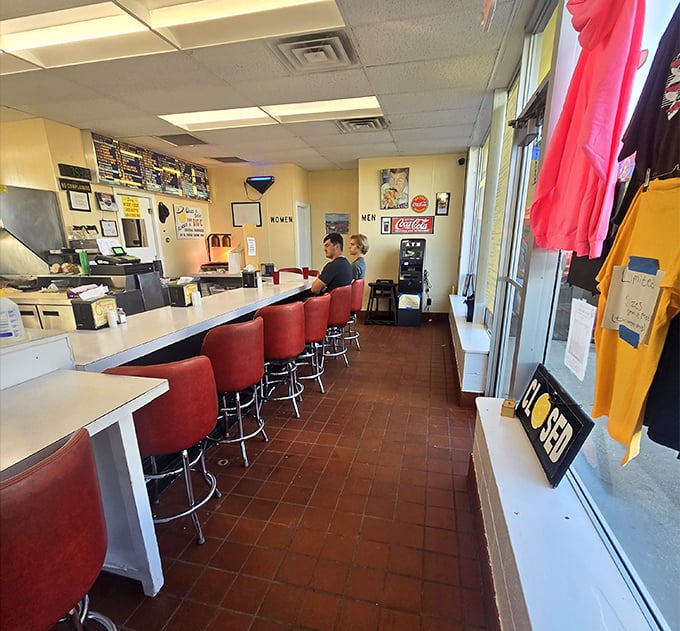 The diner's runway of red stools invites you to take a seat in burger history. No fancy tablecloths needed when the food is this good.
