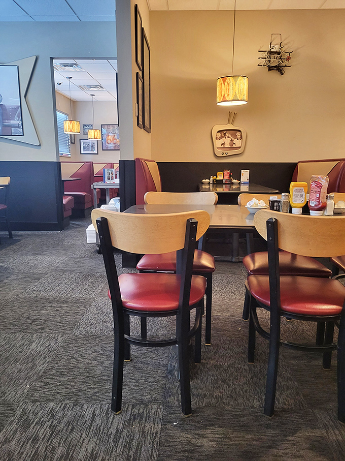 The diner's thoughtful design creates intimate dining spaces with vintage-inspired lighting that makes everyone look like they just returned from vacation.