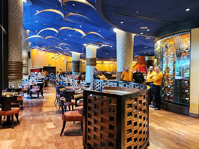 The soaring ceiling and warm lighting create an atmosphere that's both grand and surprisingly intimate.