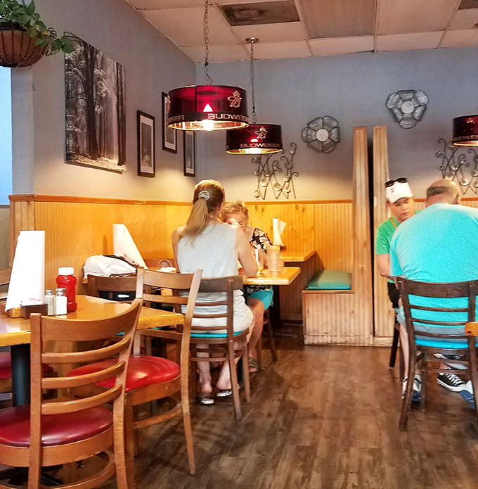 The dining area feels like someone's particularly well-equipped Florida room where calories don't count and conversations flow easily.