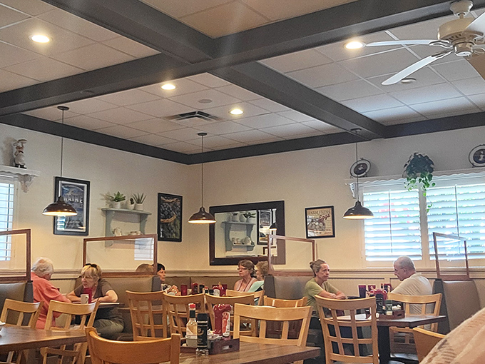 Exposed beams and thoughtful lighting create that "could be someone's really nice kitchen" vibe that makes you want to linger.