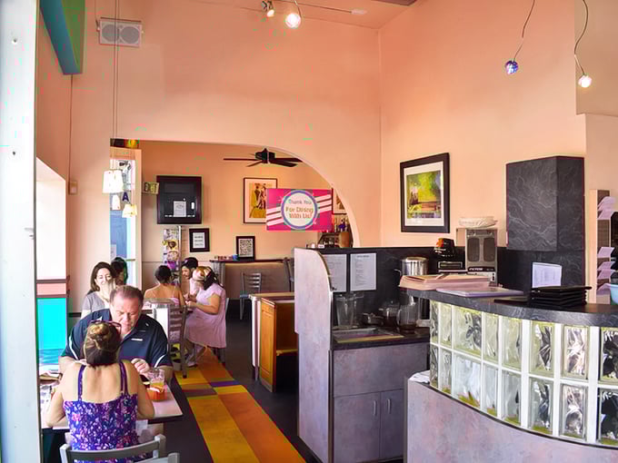 The open, airy interior feels like a community living room where the coffee's always fresh and nobody minds if you linger.