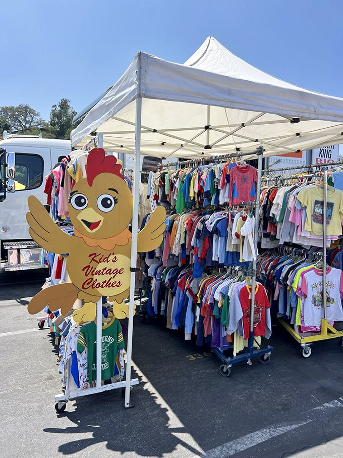 The kids' vintage section, complete with cheerful chicken mascot. Because even tiny humans deserve better style than whatever cartoon character is trending this week.
