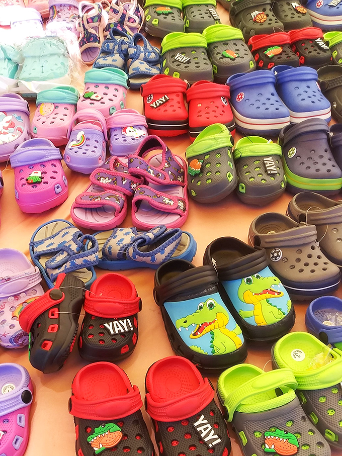 Tiny Crocs in every color imaginable. Because even the smallest feet deserve comfortable footwear with questionable fashion status.