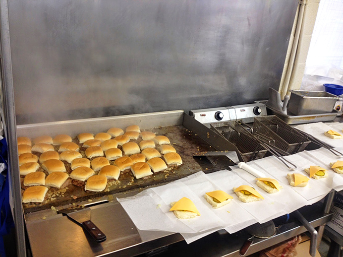 Behind the scenes, where Dixie burgers are born – dozens of buns awaiting their destiny on a sizzling flat-top that's seen decades of service.