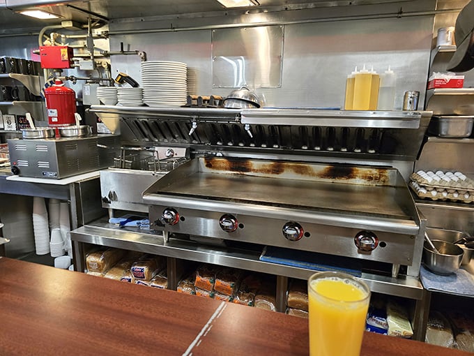 The battlefield where breakfast dreams come true. That flat-top grill has seen more action than most war zones.