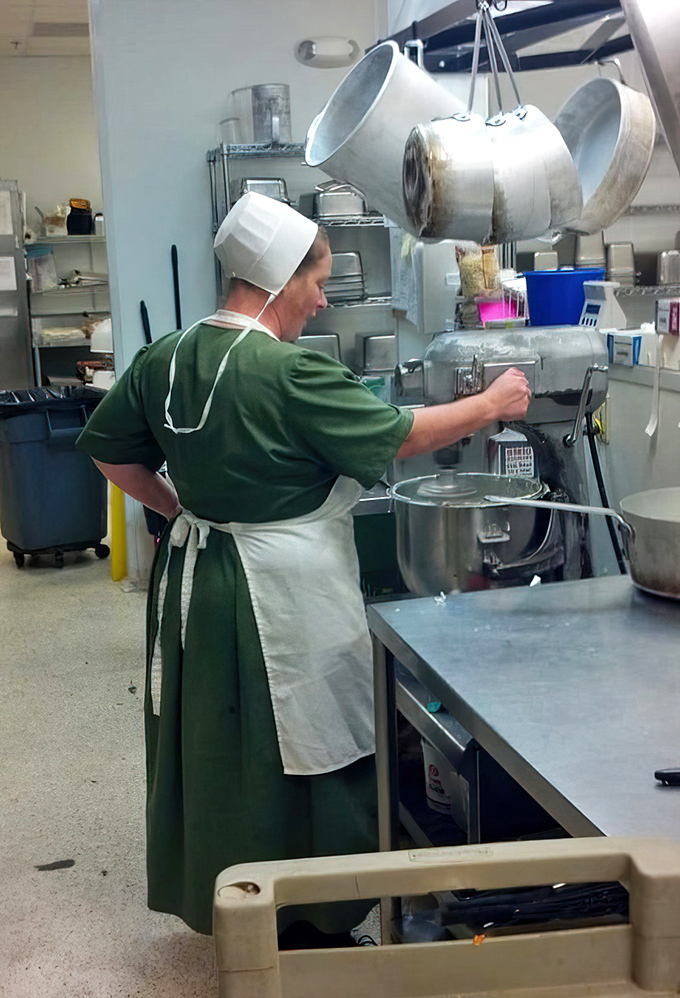 Behind the scenes, traditional methods meet modern efficiency. That apron has seen more culinary triumphs than most cooking shows.