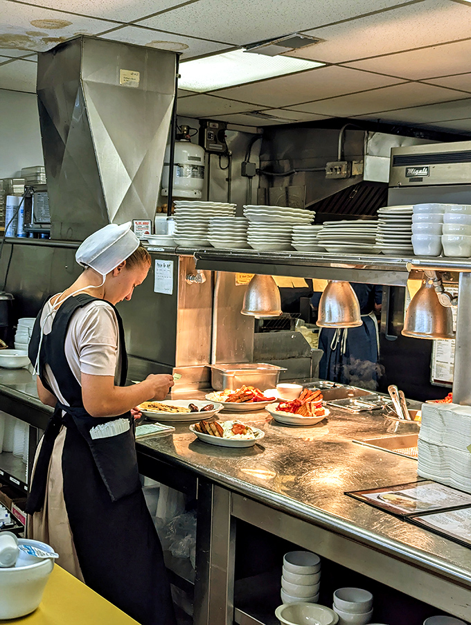 Behind the scenes, the kitchen hums with efficiency&mdash;where modern equipment meets time-honored cooking methods that can't be rushed or replicated.