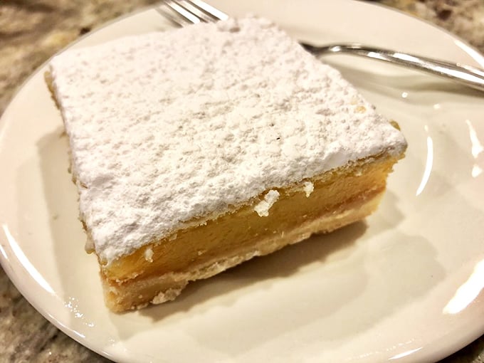 This lemon bar isn't playing around. Sunshine-yellow filling and powdered sugar snow make winter blues impossible.